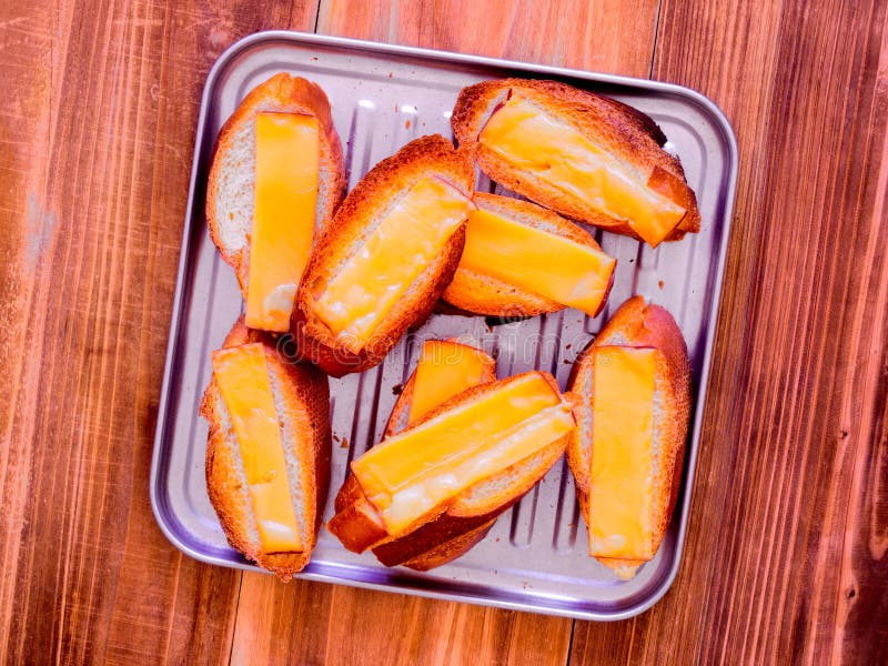 Tray of cheese toast stock photo. Image of closeup, toast - 19962030