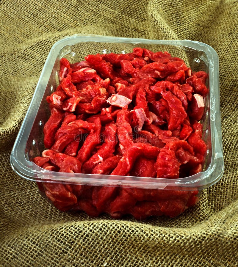 Chopped red meat on plate stock photo. Image of pieces - 29350752