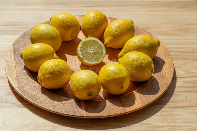 Tray with fresh lemons stock photo. Image of freshness - 394540728