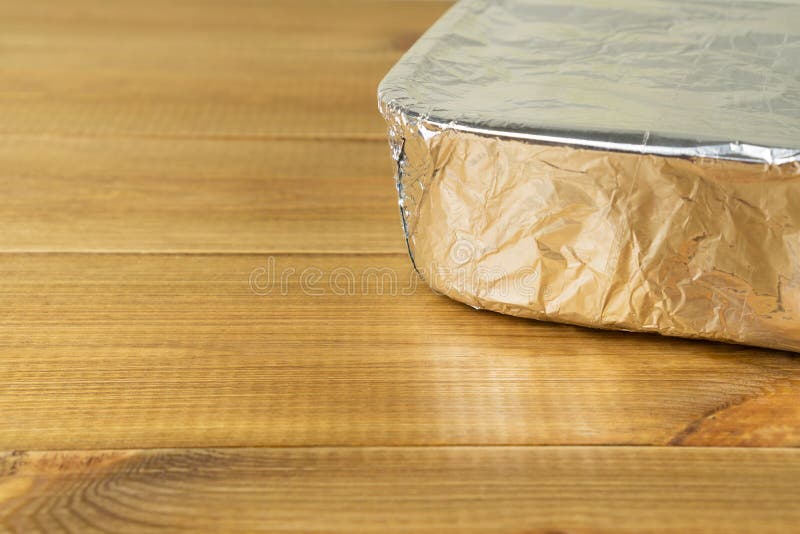 Tray with Meal Wrapped in Aluminum Foil for Baking in the Oven Stock ...