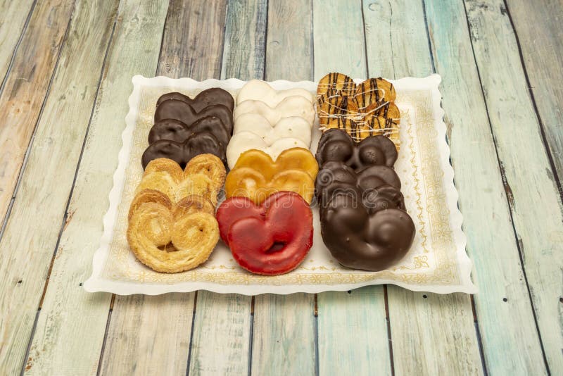 Tray of Mini Chocolate Palm Trees of Various Flavors on Wooden Table ...