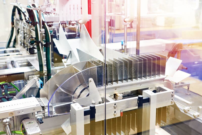 Tray packer machine stock image. Image of packaging - 244532521