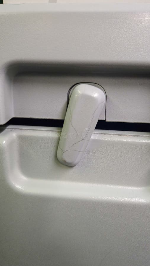 Tray Table Lock Inside an Airplane Stock Photo - Image of back ...