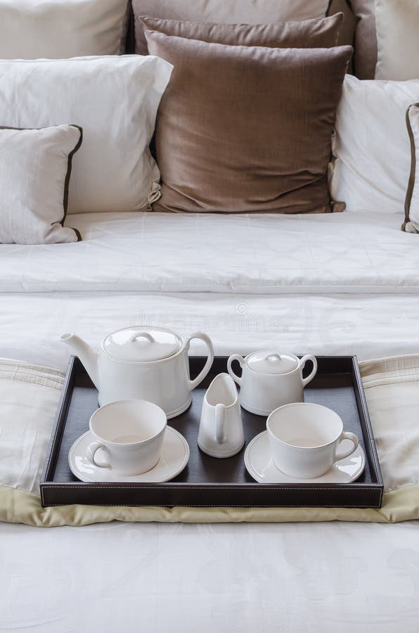 Tray of tea set on bed stock image. Image of squares - 44400189