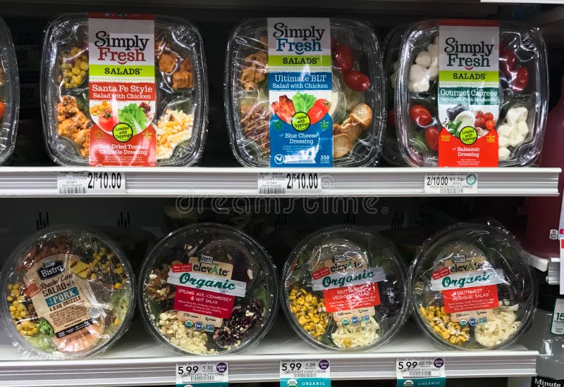 Trays of Simply Fresh Salads for Sale at a Grocery Store Editorial ... Trays of Simply Fresh Salads for Sale at a Grocery Store Editorial ...