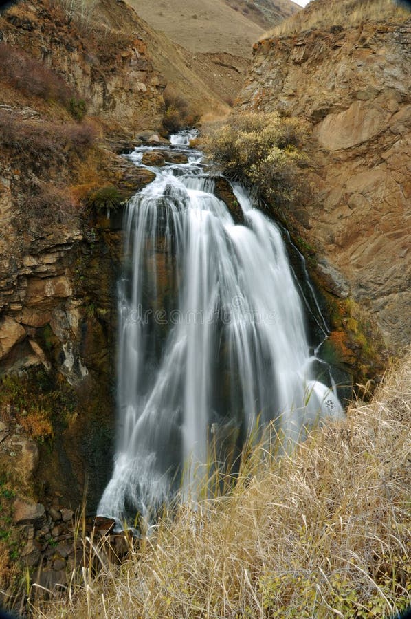 Trchkan Waterfall Flowing Downstream on a Rocky Cliff in Armenia Stock ... Trchkan Waterfall Flowing Downstream on a Rocky Cliff in Armenia Stock ...