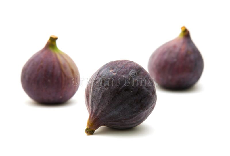 Tre fichi viola maturi fotografia stock. Immagine di fico - 16349476