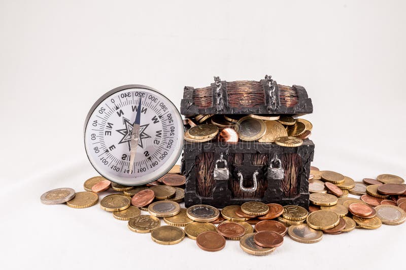 A Treasure Chest Full of Coins and a Compass Stock Image - Image of ...