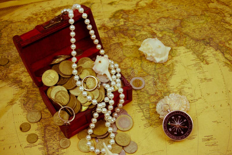 Treasure Chest with Jewelry and Coins, Compass and Shells on Vintage ...
