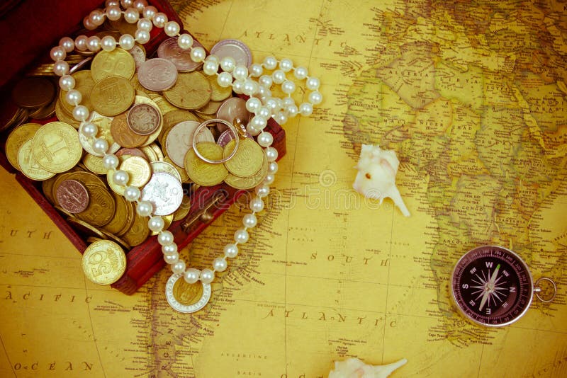 Treasure Chest with Jewelry and Coins, Compass and Shells on Vintage ...
