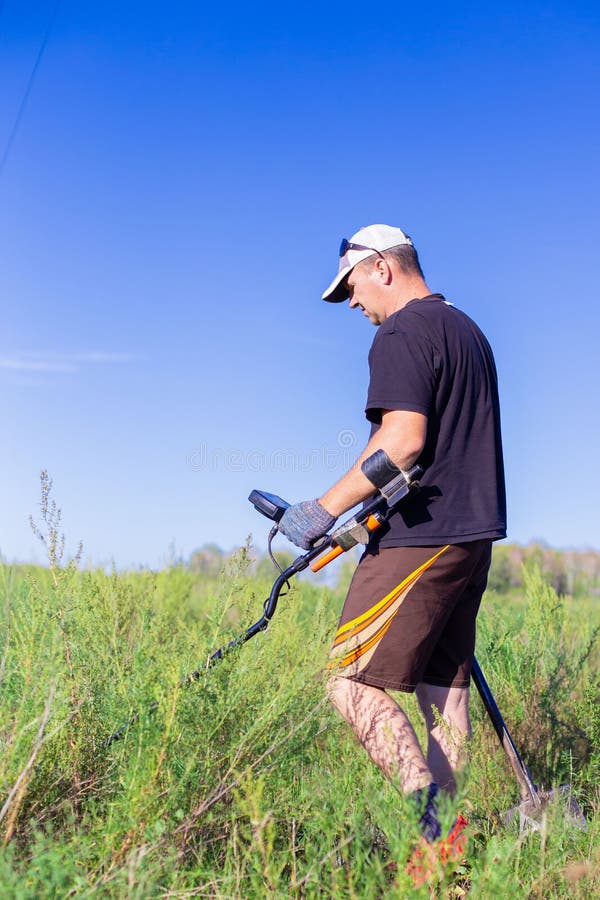 Treasure Hunter in the Field Looking for Old Coins and Artifacts Stock ...
