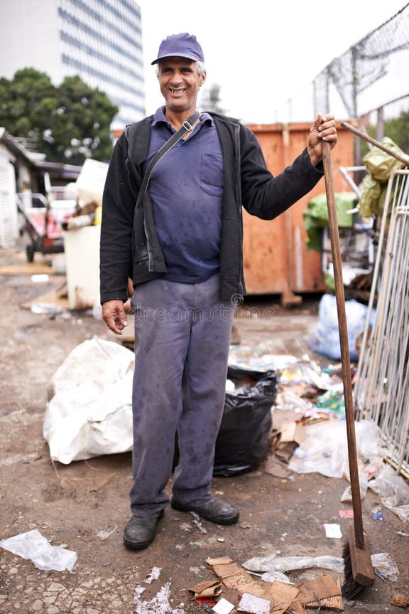 Treasure Hunting at the Dump. a Man Sorting through Garbage at a Dumping Site. Stock Image ...