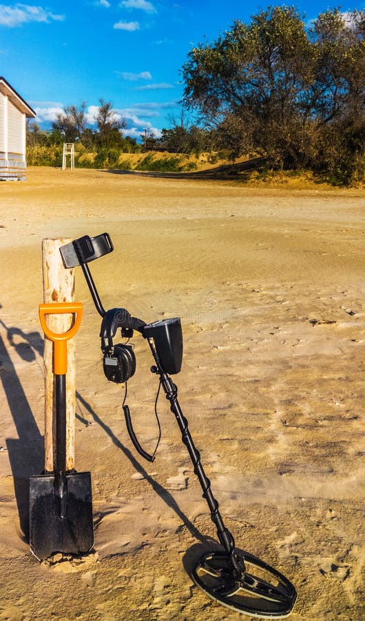 Person Using Metal Detector Stock Image - Image of seaside, seashore ...