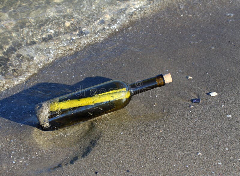 Treasure Map In The Bottle On The Shore Of The Ocean Stock Photo ...