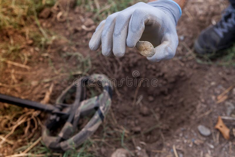 Treasure with a Metal Detector Stock Photo - Image of carving, rock ...