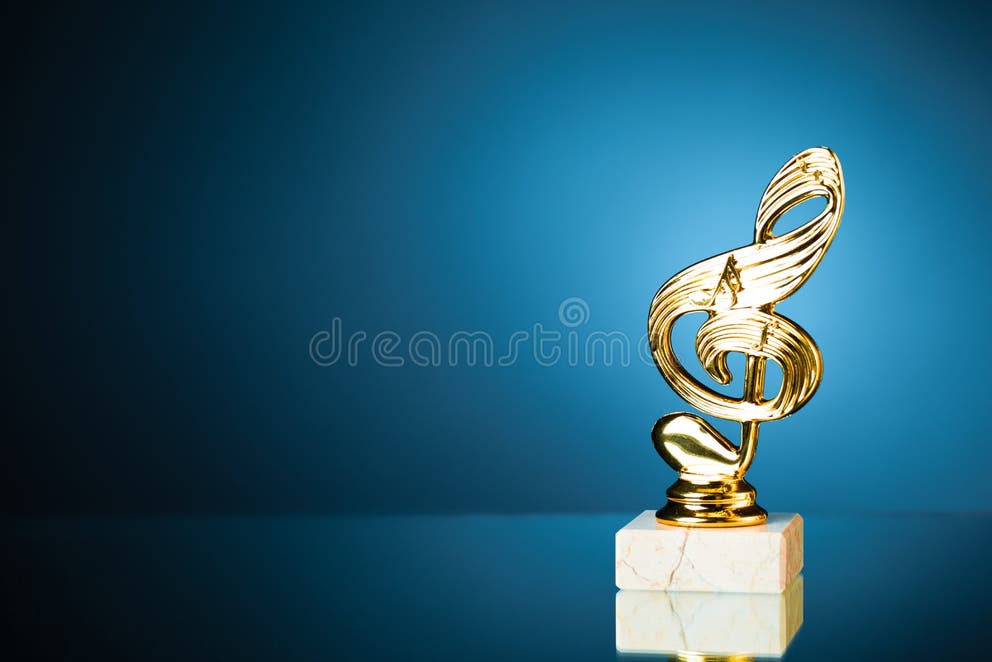 Treble Clef Symbol Trophy on Blue Background Stock Photo - Image of ...