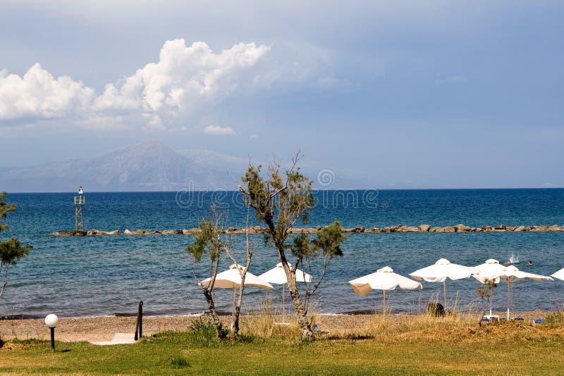 Tree, Blue Sea, Mountains and Clouds Stock Image - Image of green ...