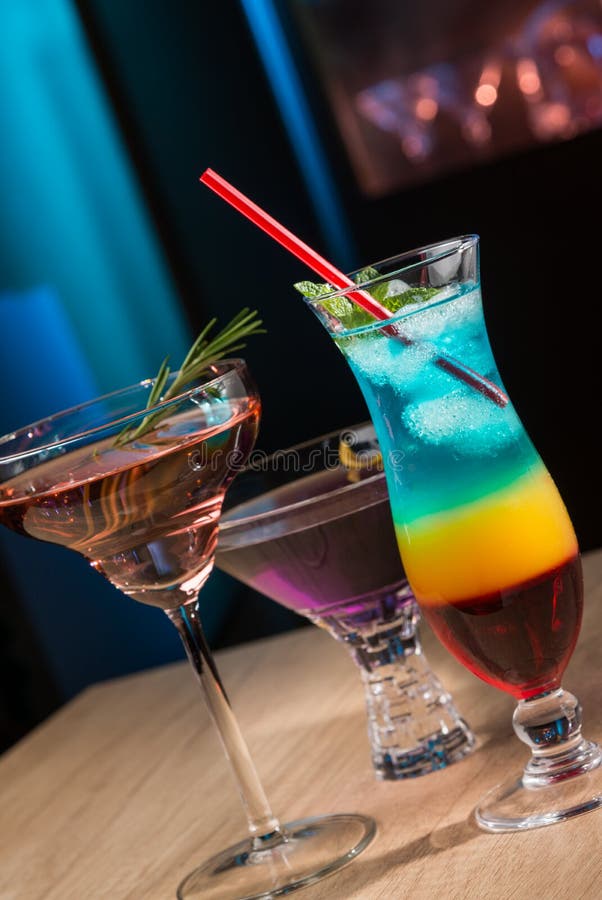 Tree cocktails in bar stock photo. Image of angled, drink - 135216502