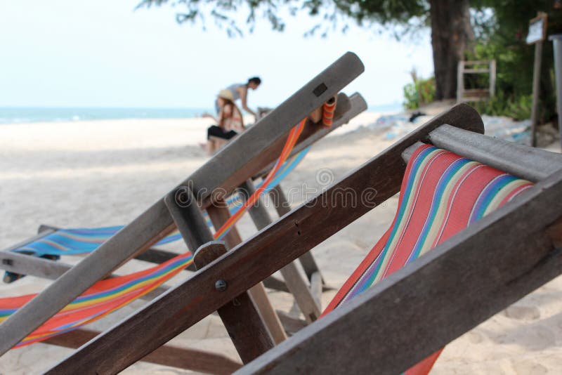 Tree Deck Chairs on the Beach Stock Image - Image of relax, blue: 40915905