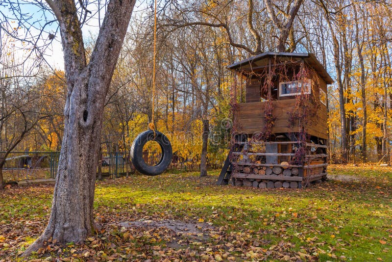 Tree House in Autumn Garden Stock Image - Image of brown, outdoor: 81697025