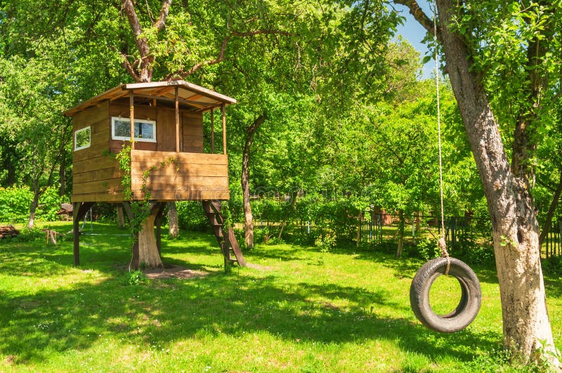 Tree house in the garden stock photo. Image of hotel - 63411950