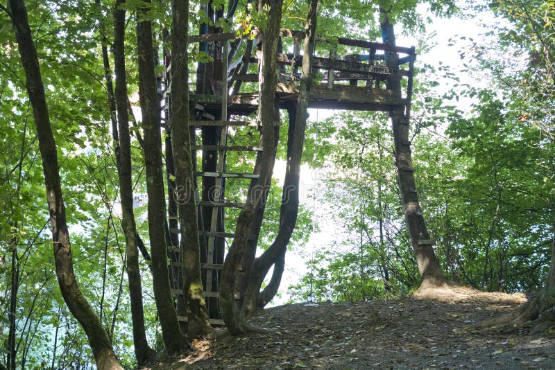 Tree fort by the river stock image. Image of treehouse - 44266141