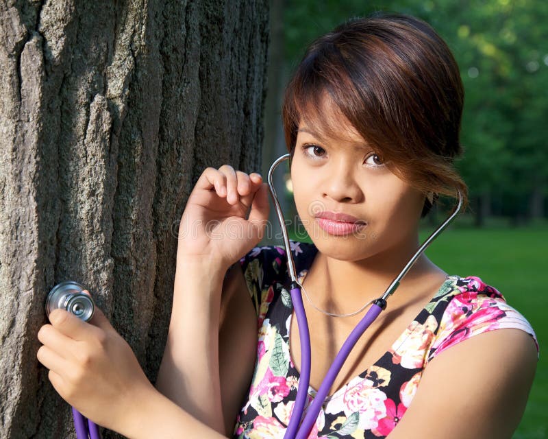 Tree Hugger with Stethoscope Stock Photo - Image of park, hands: 25635446