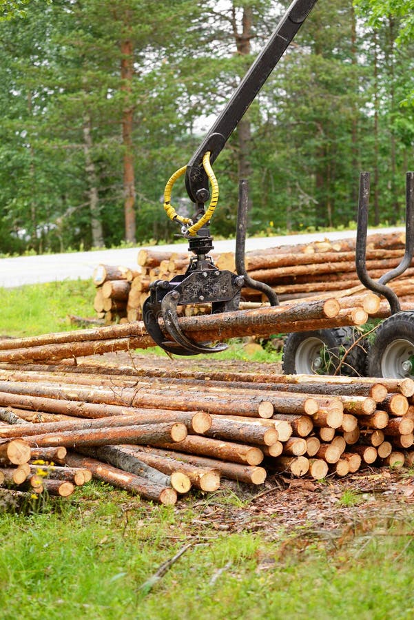 Tree Log Hydraulic Manipulator - Tractor Stock Photo - Image of ...