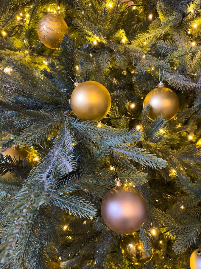 A Tree with Many Golden Ornaments on it Stock Image - Image of ...