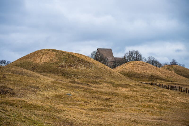 The Tree Royal Mounds at Gamla Uppsala.. Stock Image - Image of clouds ...