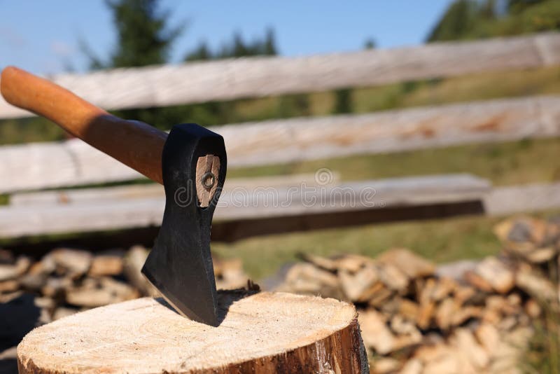 Tree Stump with Axe Outdoors, Space for Text Stock Image - Image of ...
