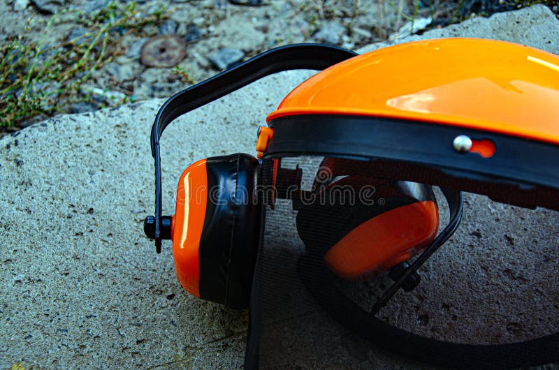Tree Surgeon Tools on Desk Including Chainsaw, Helmet, Harness, Ear Defenders and Rope Stock ...