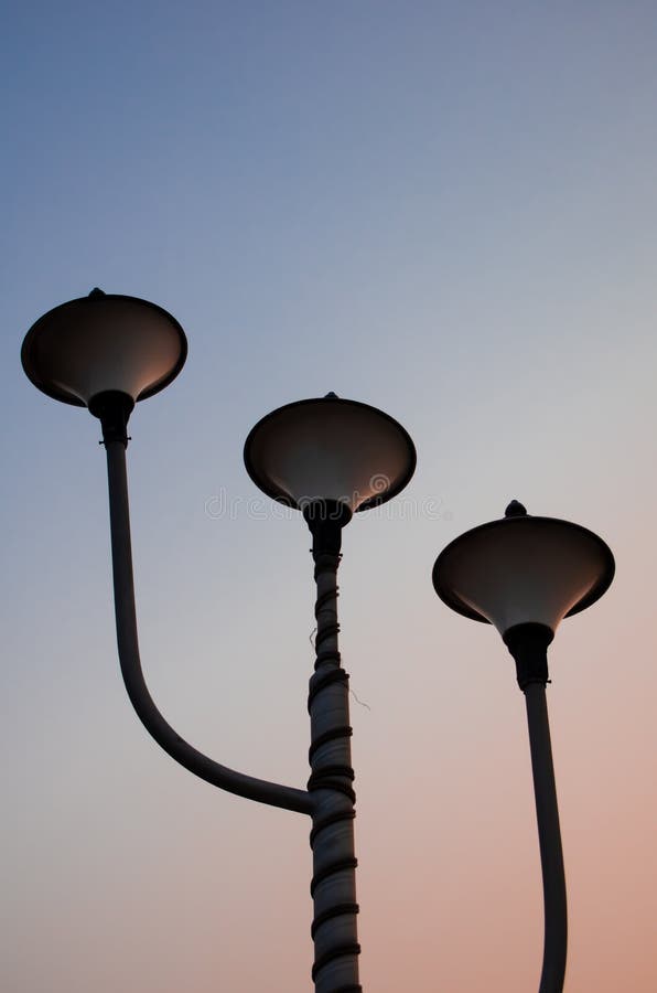 A Tree of Three Lamps on a Sunset in India Stock Image - Image of ...