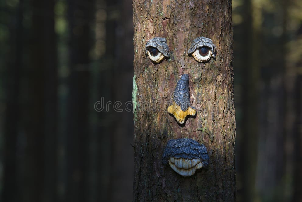 Tree Trunk Decorated with Face Stock Image - Image of sculpture ...