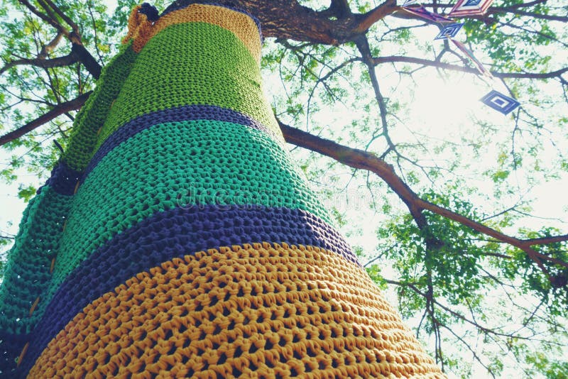 Tree Trunks Decorated with Dressed in Beautifully Knitted Creations in ...
