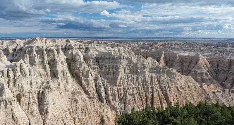 Trees Infront of Sandstone Ridges Stock Image - Image of erosion, bands ...