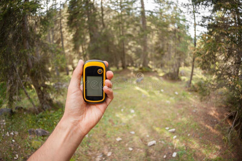 A Trekker Using a Gps Inside the Forest Stock Photo - Image of hand ...