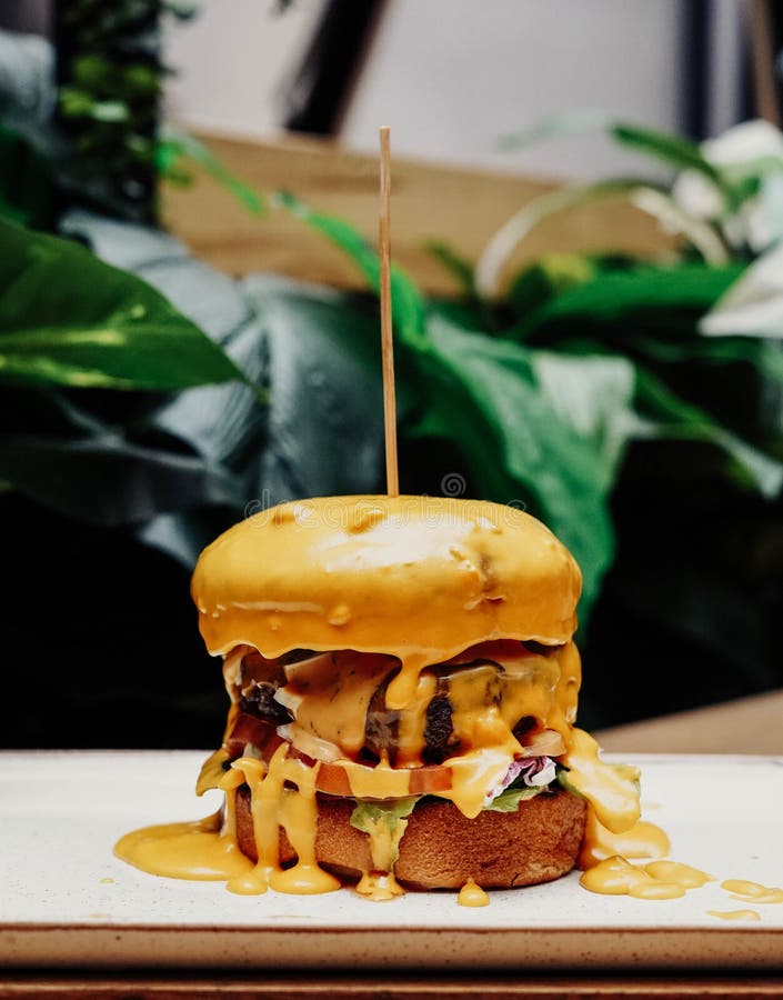 Tremendous Double Burger with Extra Cheddar Cheese Stock Photo - Image ...