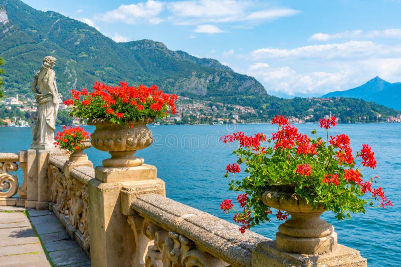 Tremezzo Viewed Behind Flowers, Italy Stock Image - Image of waterfront ...