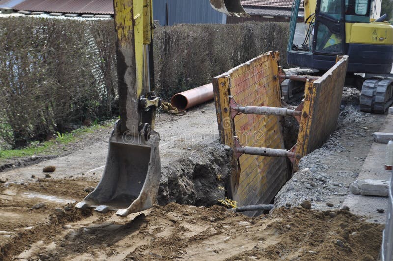 Trench Digging for the Placement of a Garage Footing. Stock Photo ...