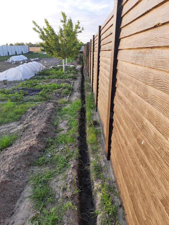 A Trench Dug in the Ground for Laying Irrigation. Stock Image - Image ...