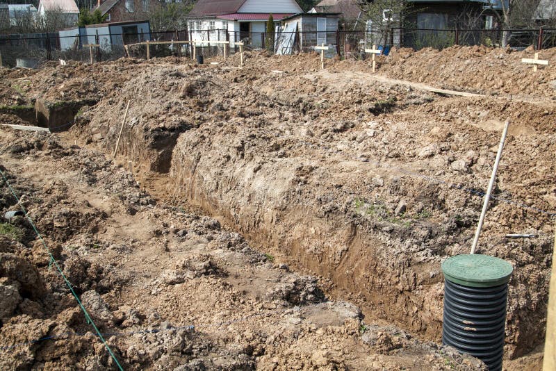 Trench Dug by Hand Under the Foundation or for Laying Drainage Stock ...