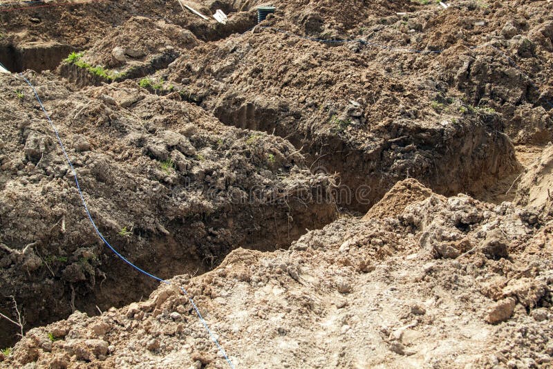 Trench Dug by Hand Under the Foundation or for Laying Drainage Stock ...