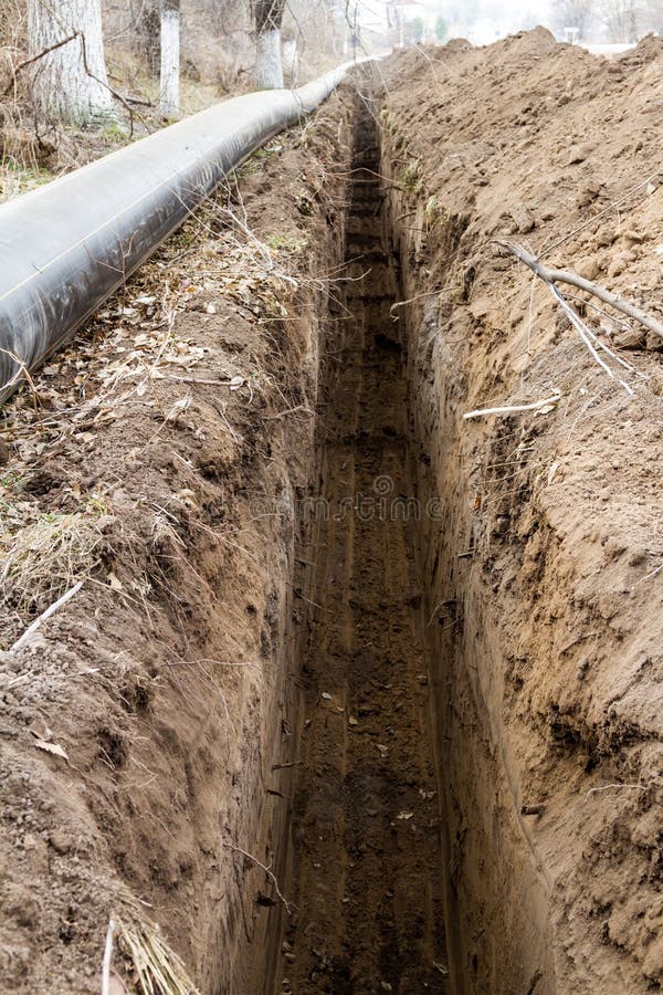 Trench laying pipe stock photo. Image of line, plastic - 80825080