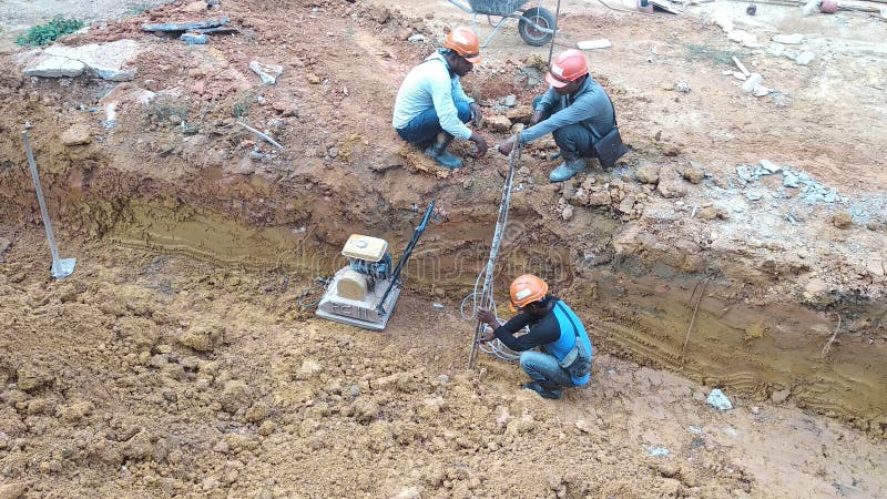 Trenches Excavated at the Construction Site by Construction Workers To ...