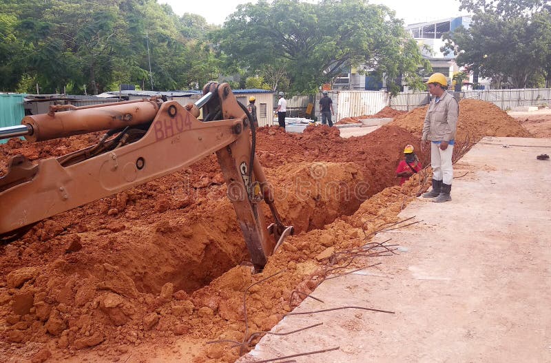Trenches Excavated at the Construction Site by Construction Workers To ...
