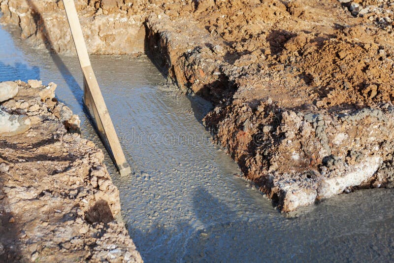 Trenches Filled with Concrete Stock Image - Image of work, mortar ...
