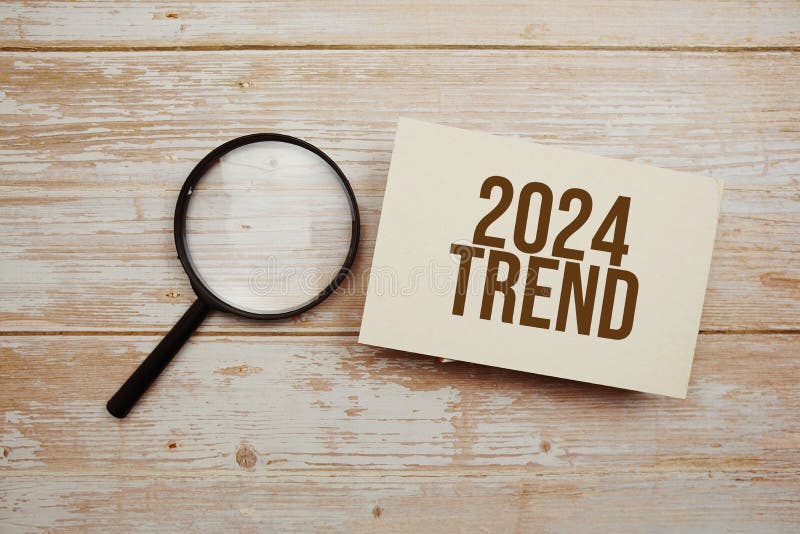 Trend 2024 Text Message and Magnifying Glass with Space Copy on Wooden ...