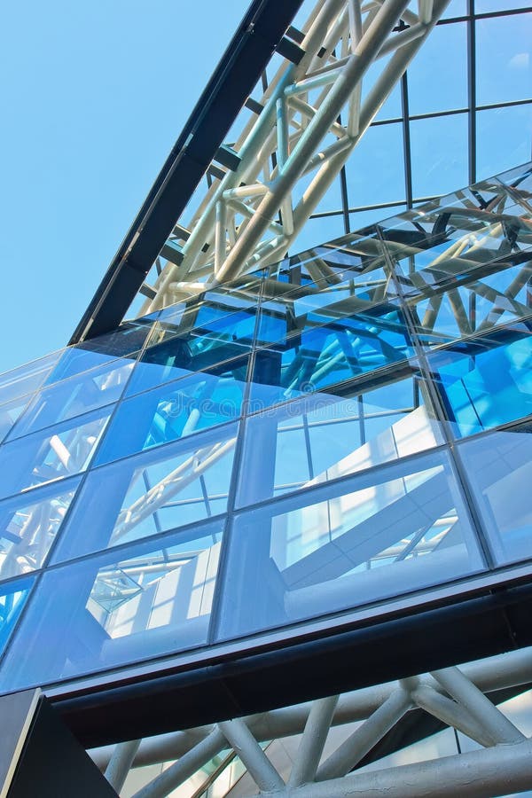 Trendy Architecture with Blue Glass Panels in a Metal Construction ...
