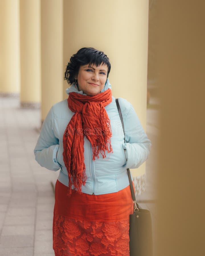Woman walking in town stock image. Image of town, person - 132926747